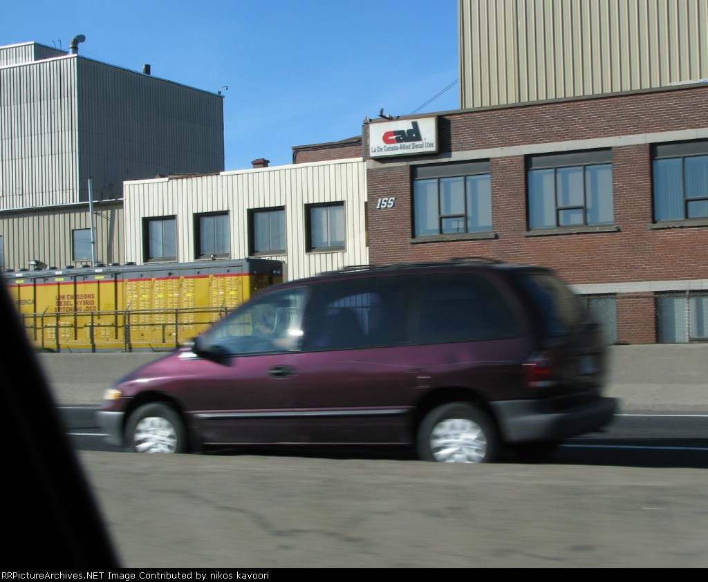 UPY 2303 and a purple van